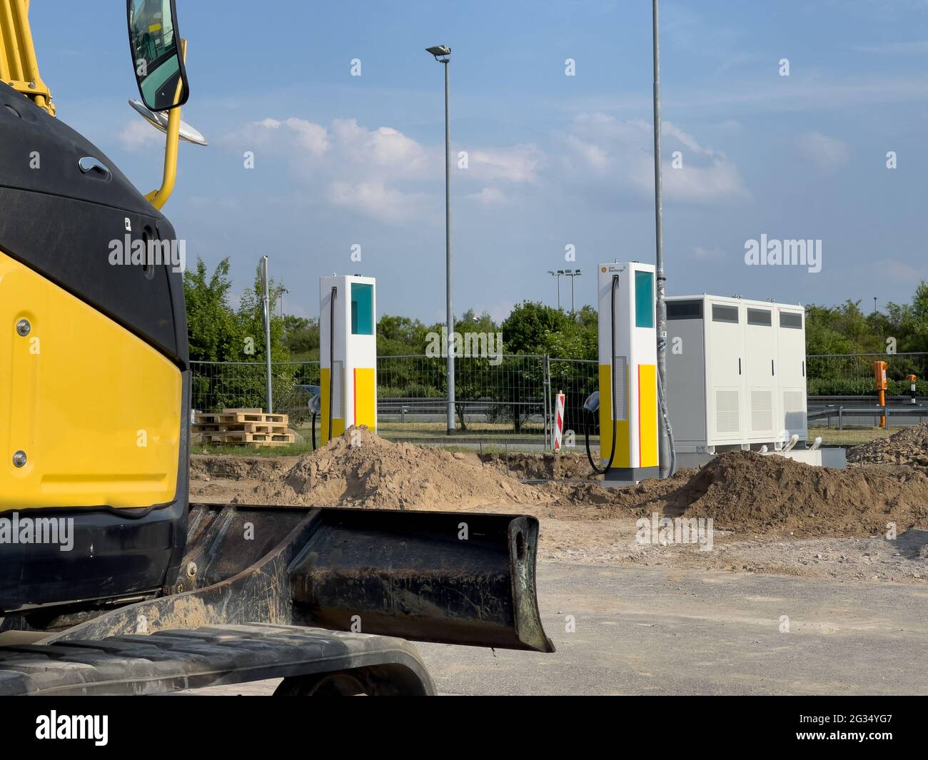 Charging columns for electric vehicles are installed on the premises of ...