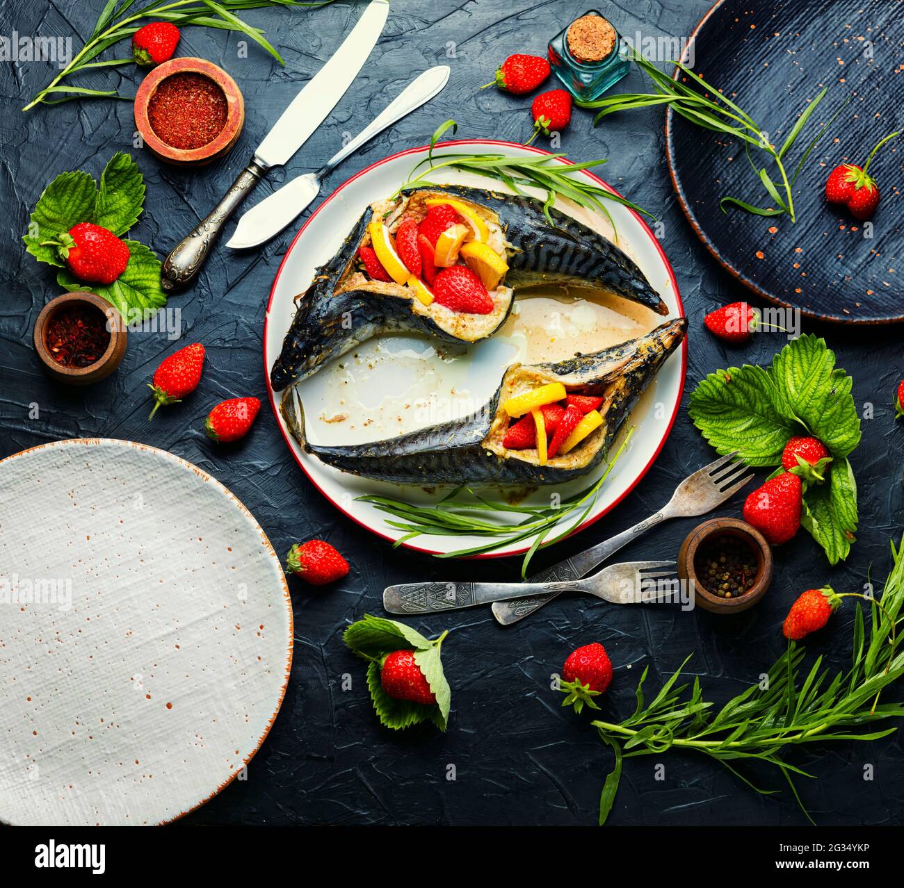 Fish roasted with berries and lemon.Summer fish dish,baked mackerel ...