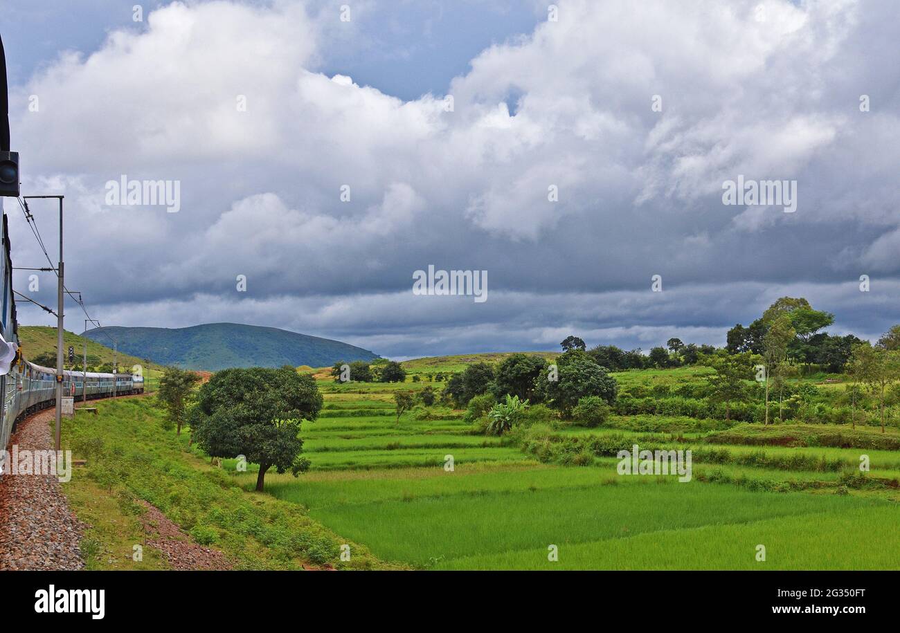 Indian Railways train Kirandul Passenger running through Araku Valley ...