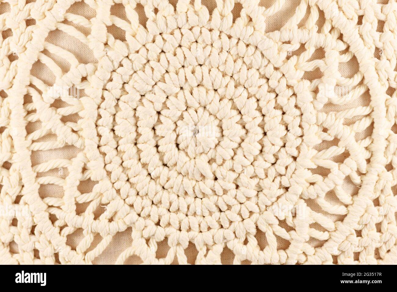 Circle shaped Macramé patern, a form of textile produced using knotting ...