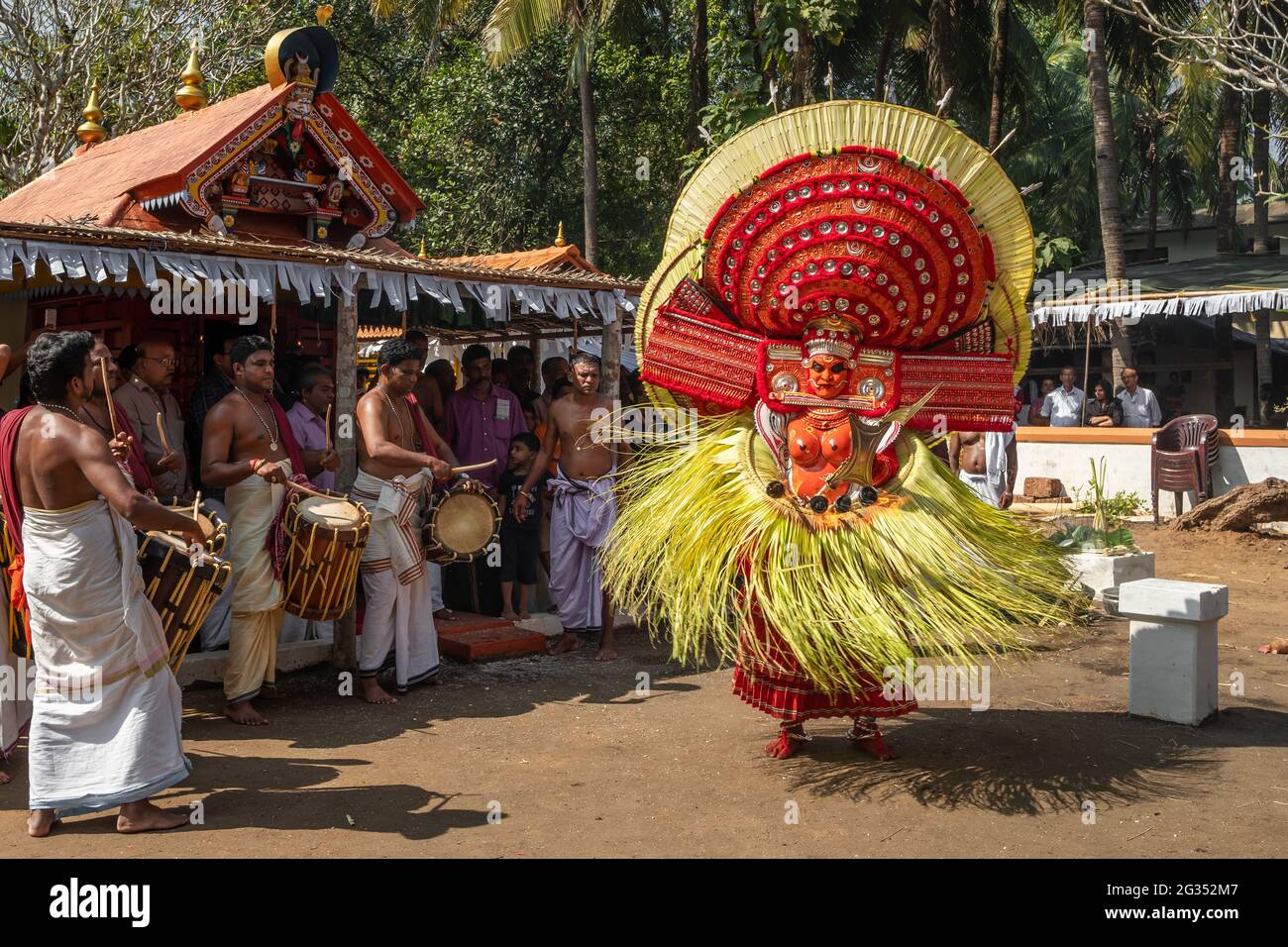 Theyyam artist perform during temple festival in Payyanur, Kerala ...