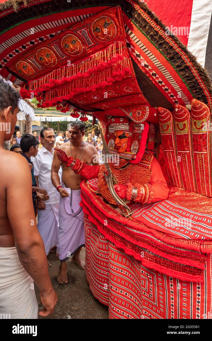 Theyyam artist perform during temple festival in Payyanur, Kerala ...