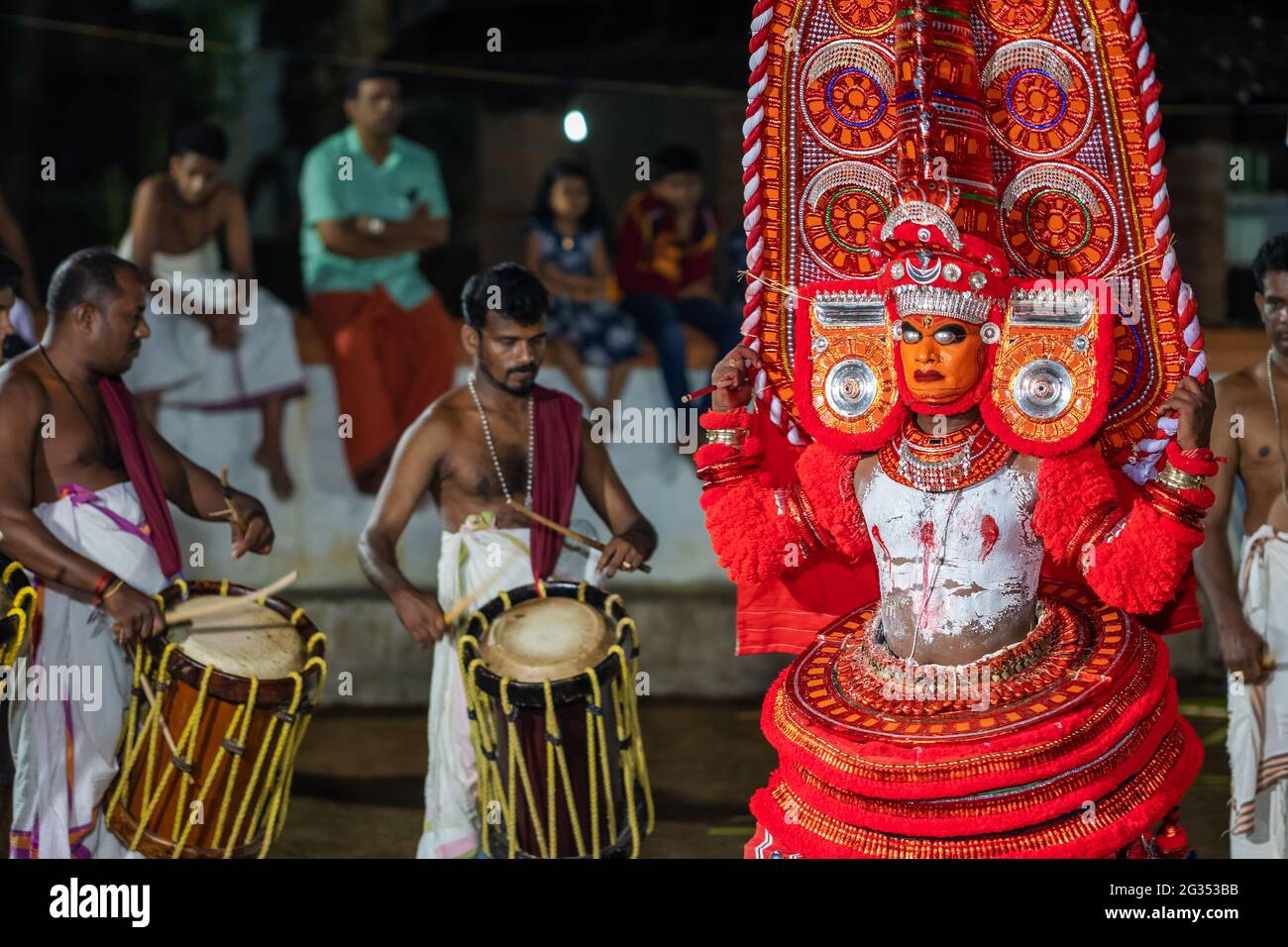 Theyyam artist perform during temple festival in Payyanur, Kerala ...