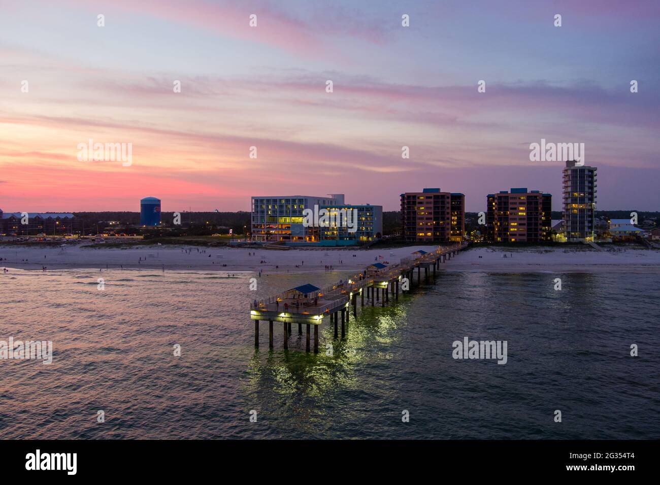Orange Beach at sunset Stock Photo - Alamy
