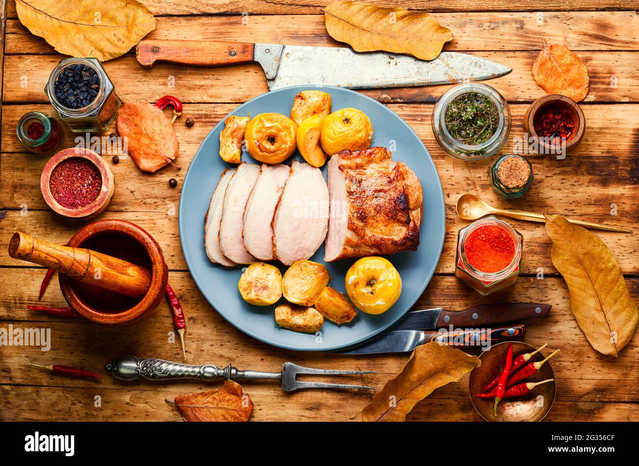 Baked meat with apples.Fried pork loin stuffed with apple Stock Photo ...