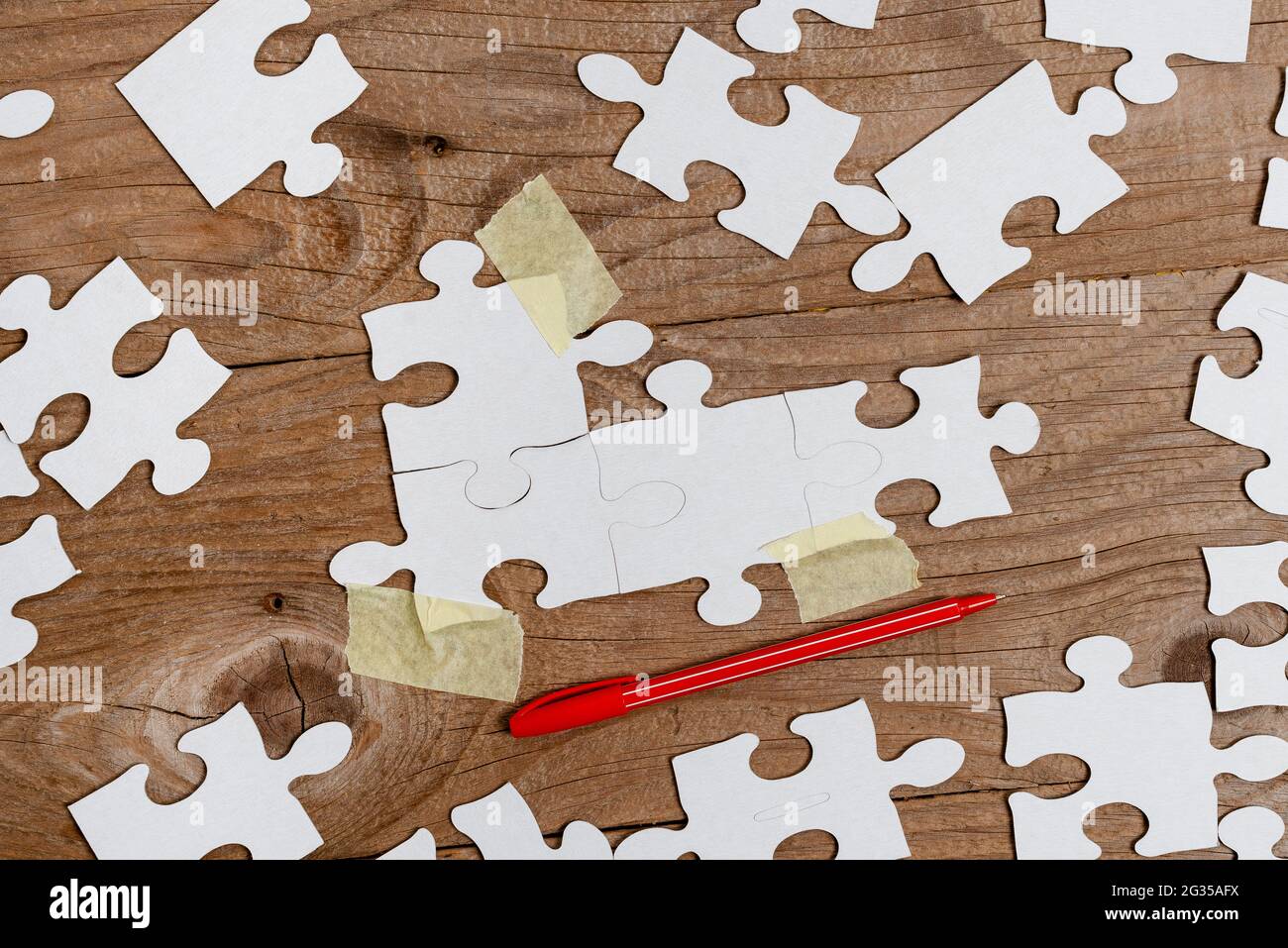 Close-Up White Jigsaw Pattern Puzzle Pieces To Be Connected With ...
