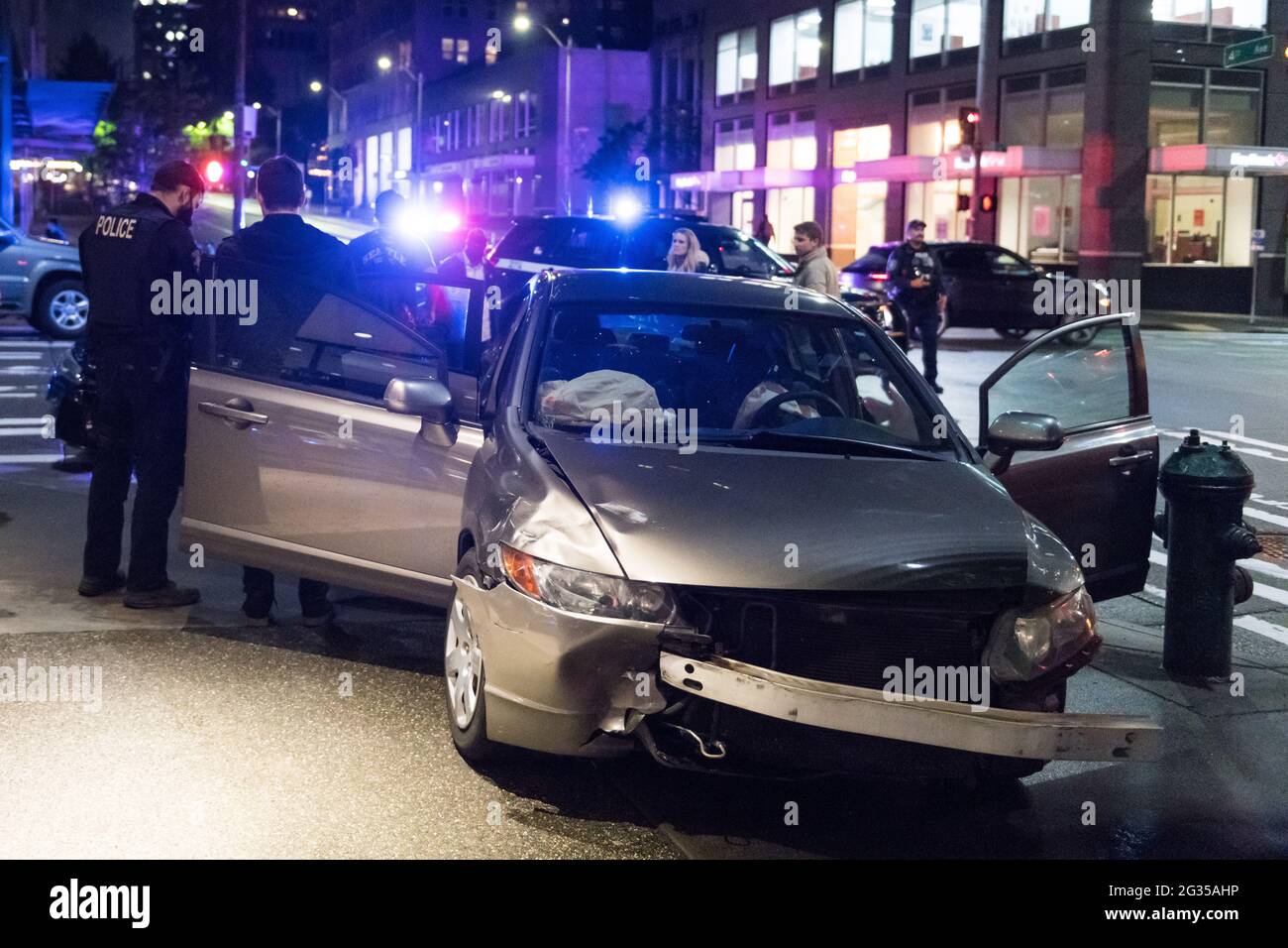 Seattle, USA. 13th Jun, 2021. Late in the evening a two-vehicle ...