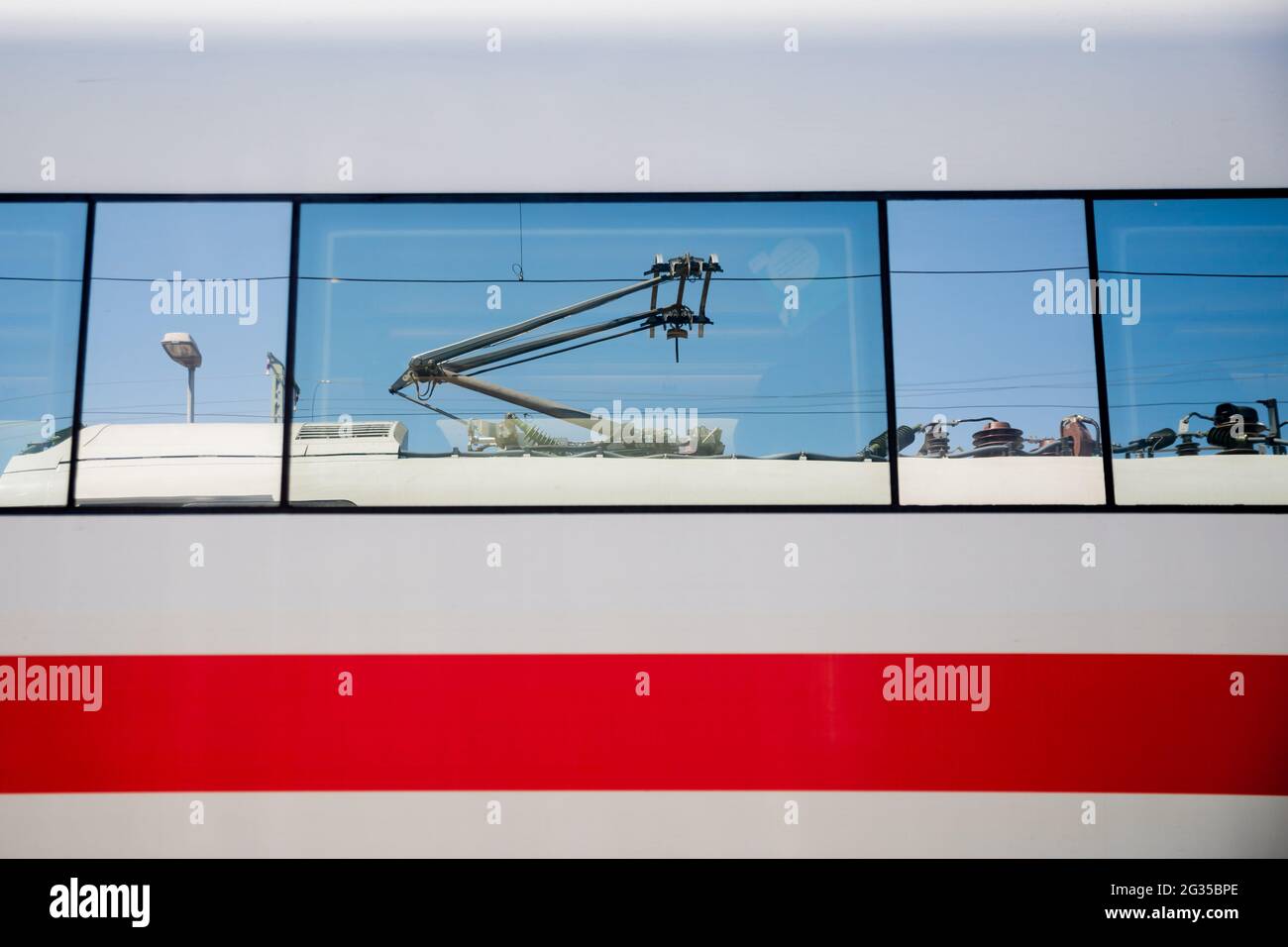 Berlin, Germany. 09th June, 2021. The pantograph of an ICE train is ...