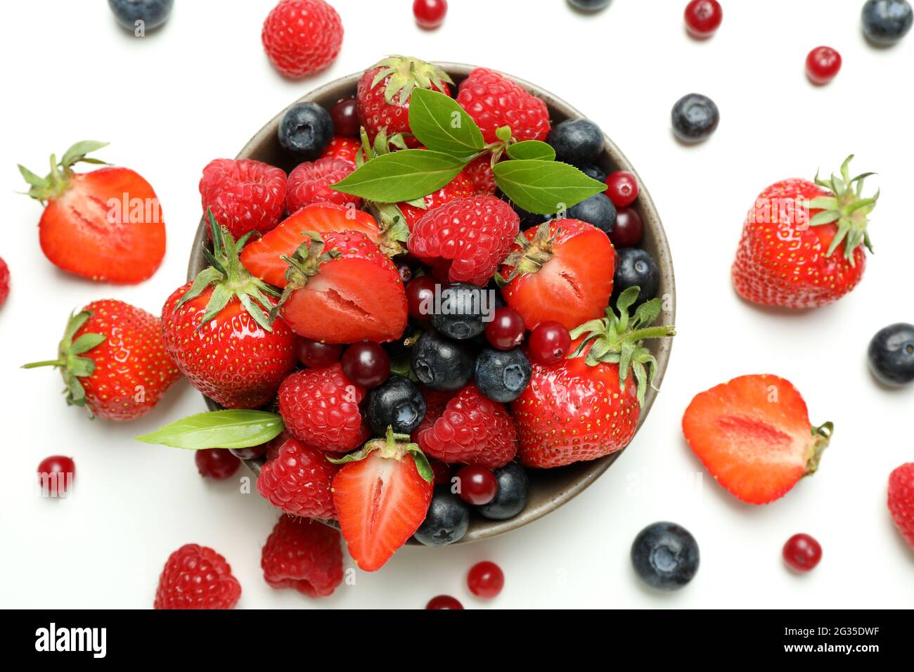 Delicious fresh berry mix on white background Stock Photo - Alamy