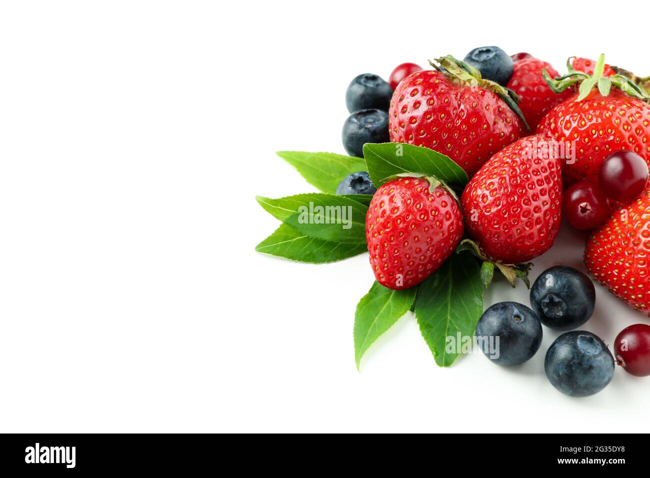 Delicious berry mix isolated on white background Stock Photo - Alamy