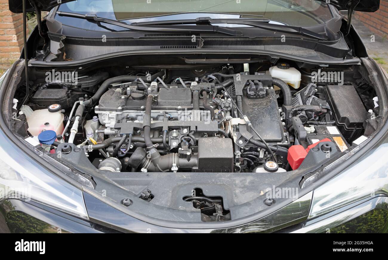 Close up detail of a modern car dirty petrol engine bay Stock Photo - Alamy