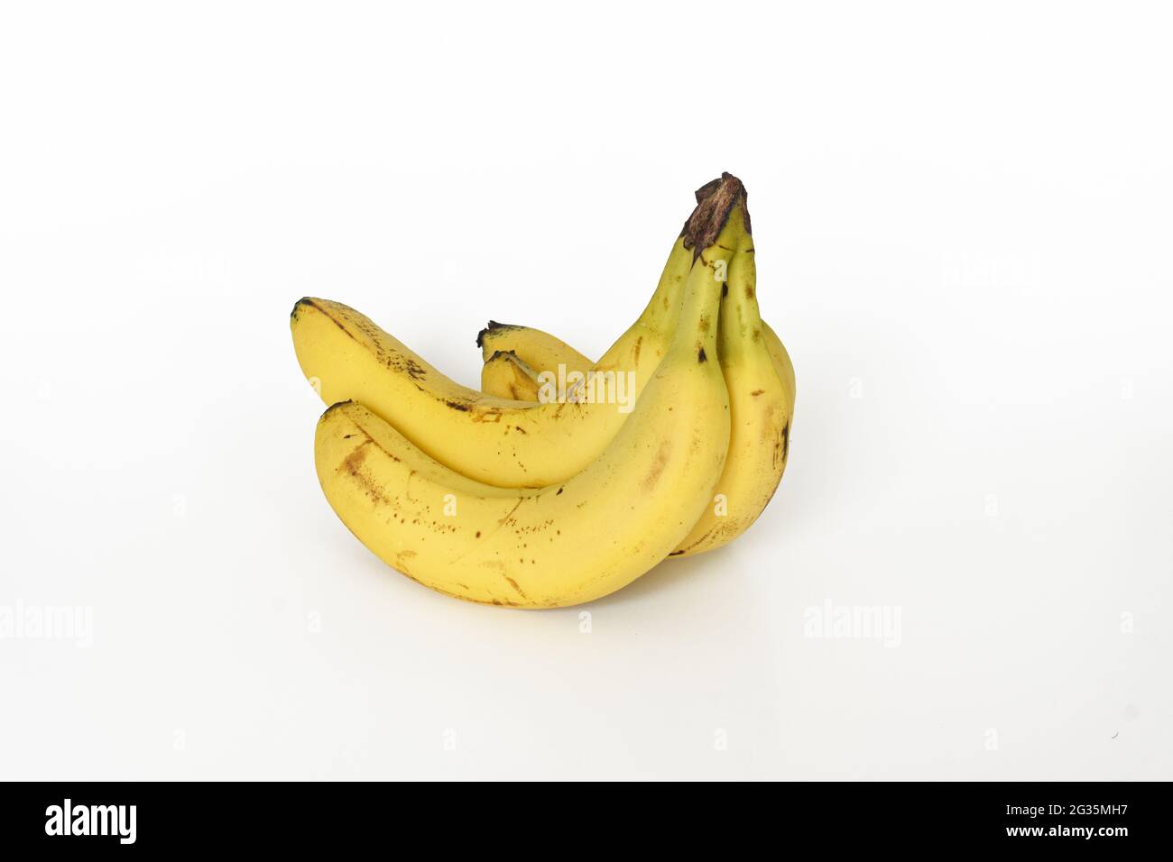 Yellow ripe bananas on isolated white background Stock Photo - Alamy