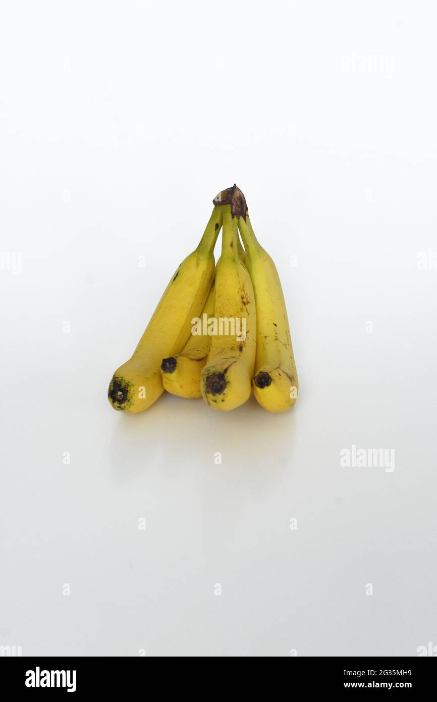 Yellow ripe bananas on isolated white background Stock Photo - Alamy
