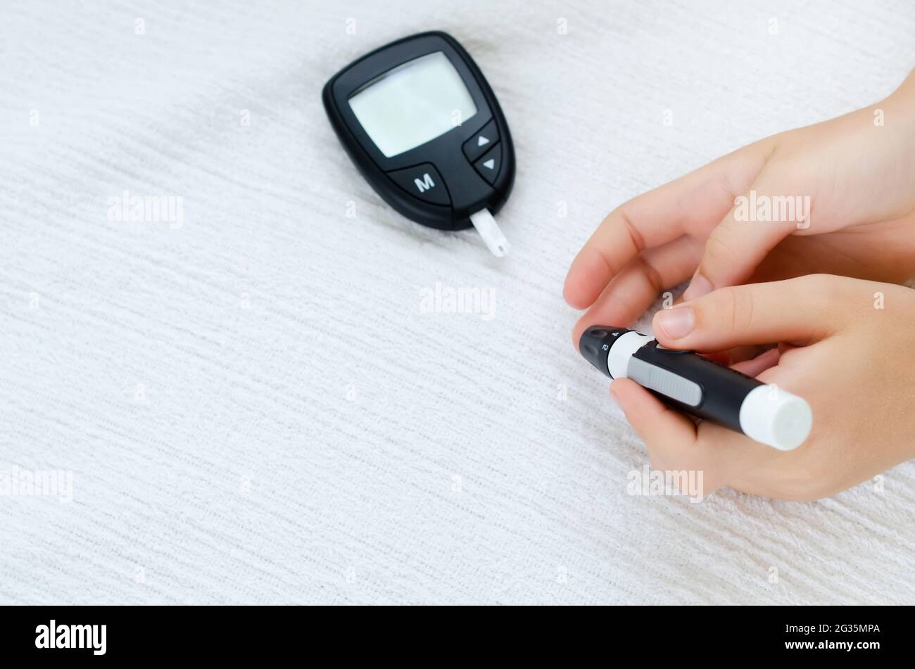 Diabetes and Glycemia. Blood sugar testing, child finger lancet ...