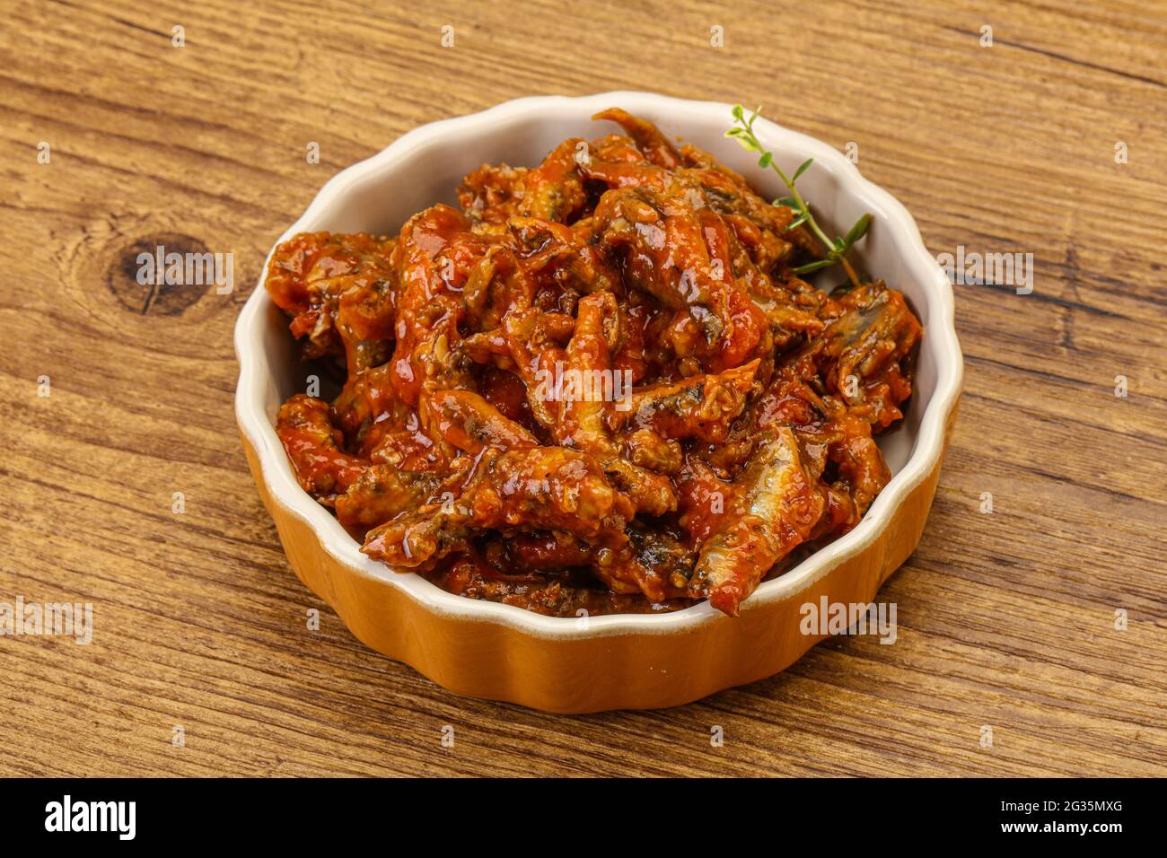 Canned anchovy snack in tomato sauce Stock Photo - Alamy
