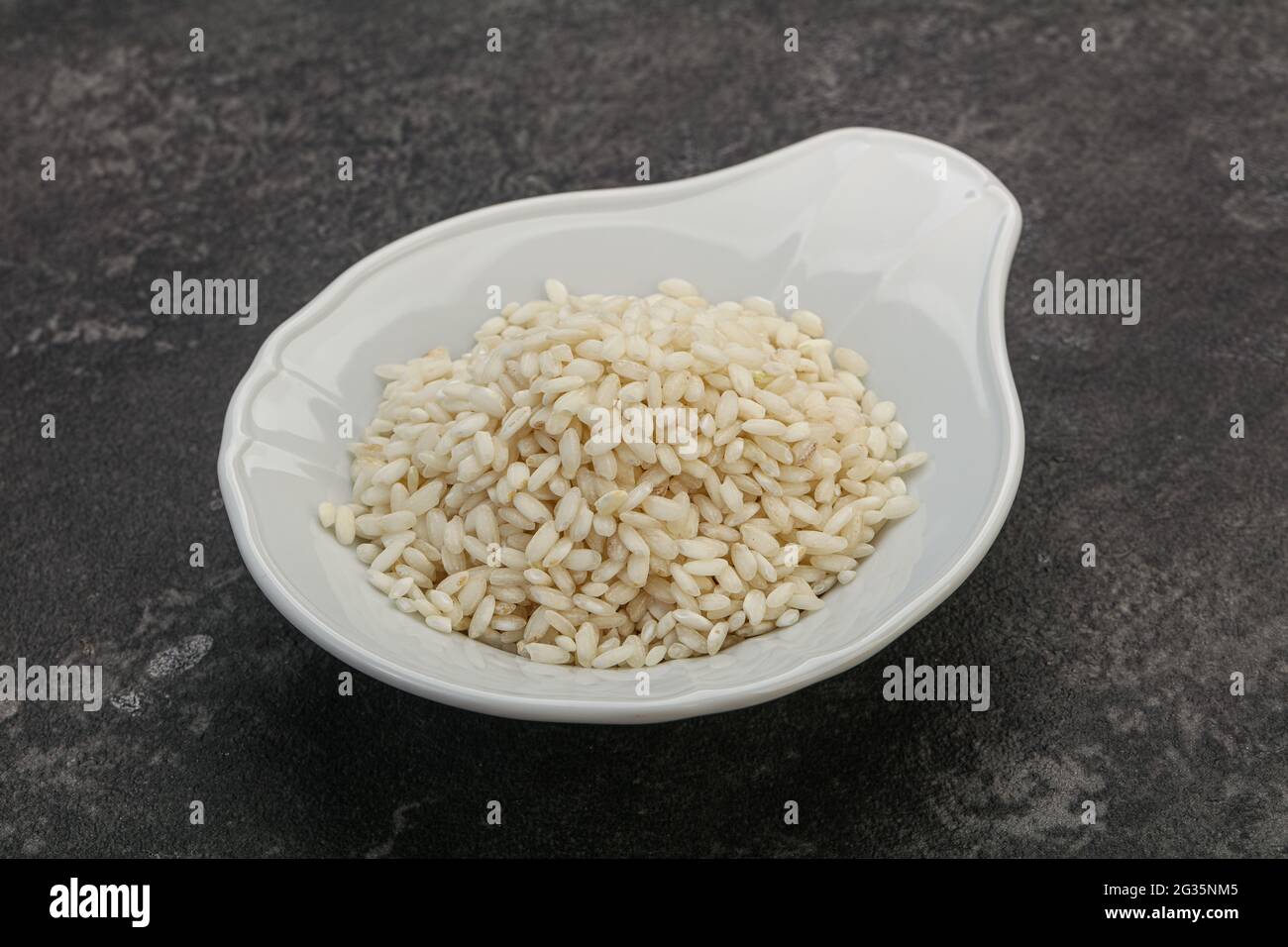 Raw Italian arborio rice for Risotto Stock Photo - Alamy