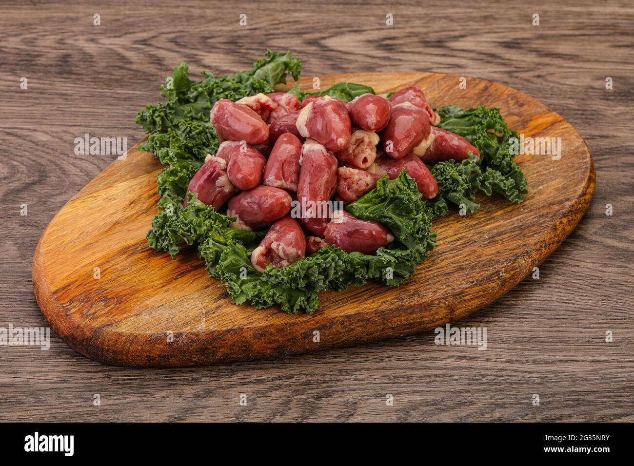 Raw chicken hearts heap for cooking Stock Photo - Alamy