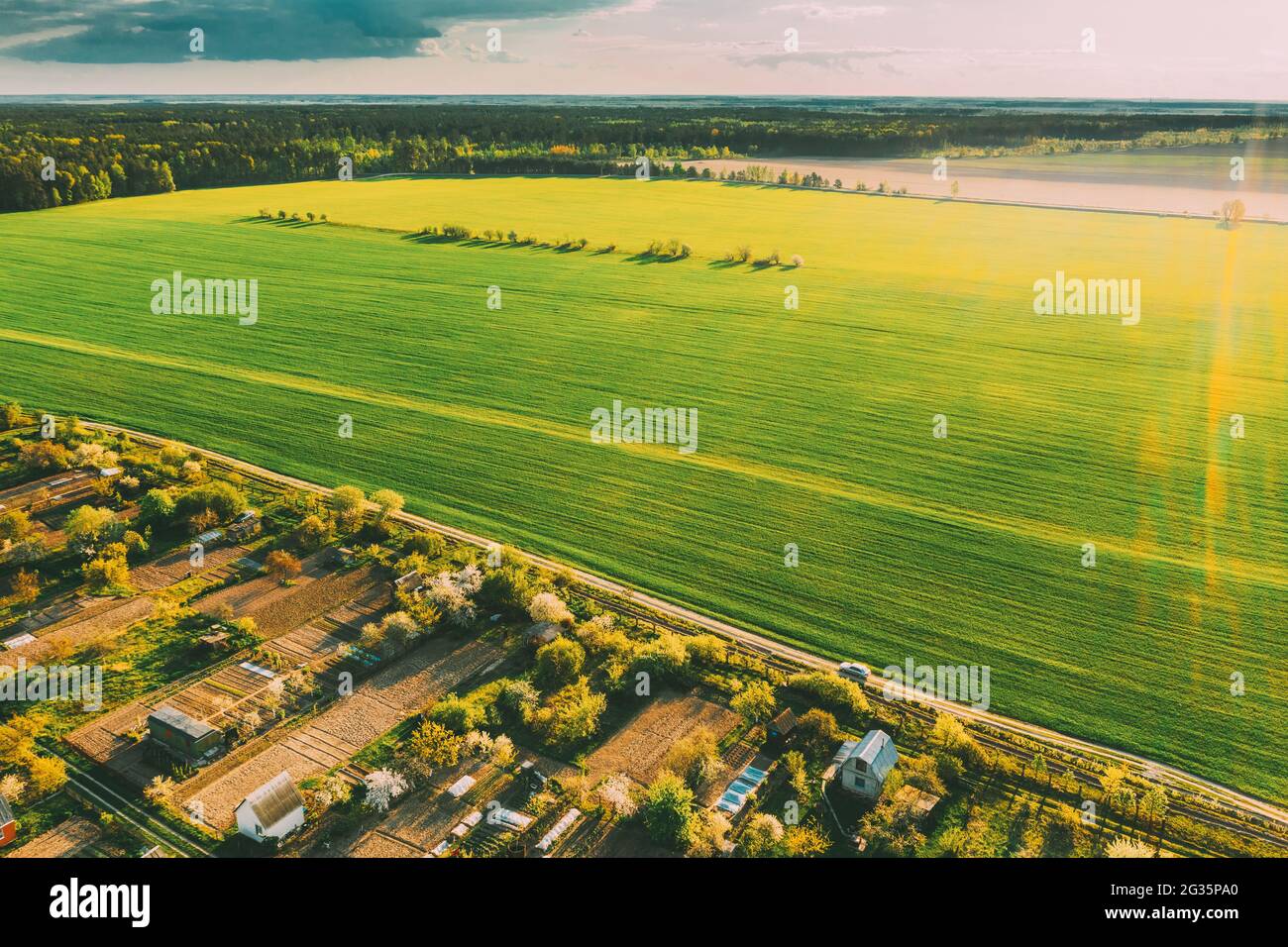Countryside Rural Landscape With Small Village, Gardens And Green Field ...