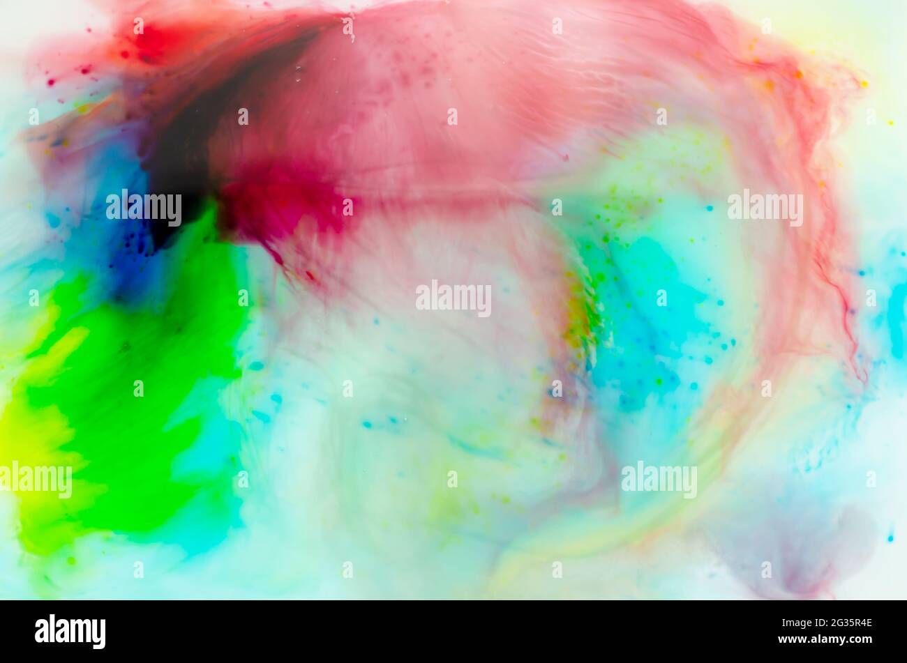 Abstract defocused composition with watercolors in water. Streams and ...
