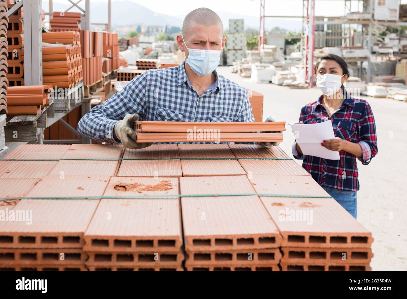 Builder mask bricks hi-res stock photography and images - Alamy
