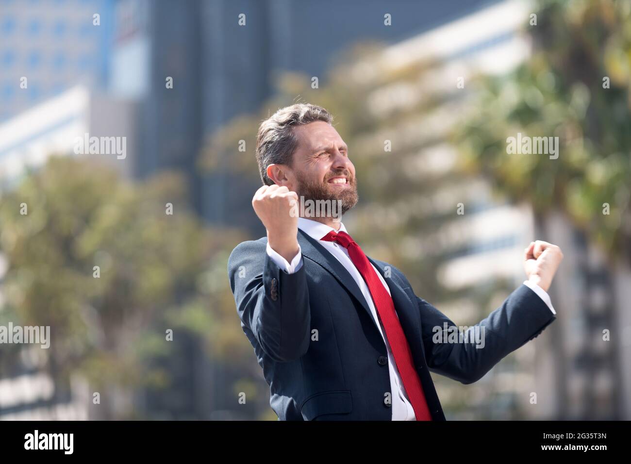 Business man celebrating hi-res stock photography and images - Alamy