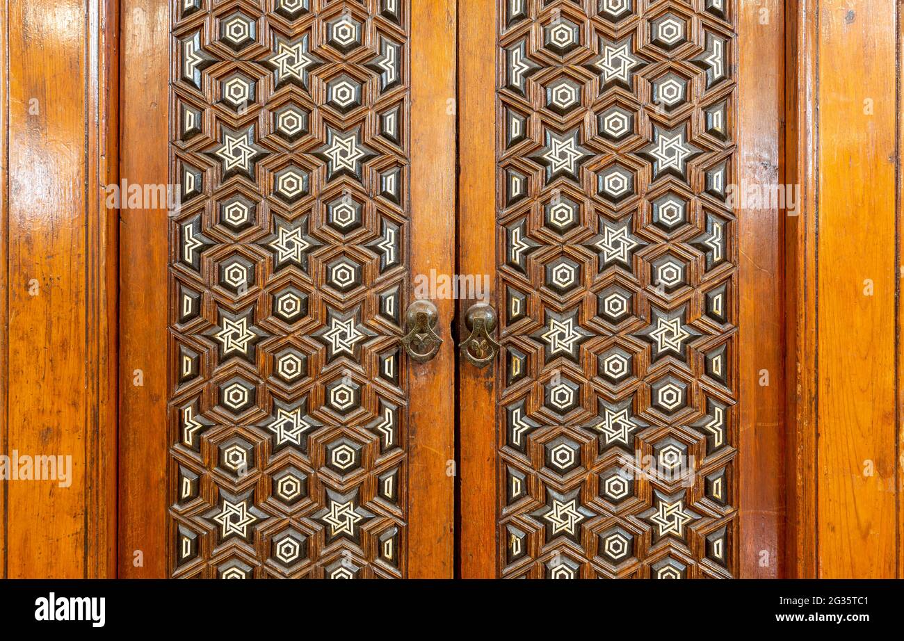 Closeup of wooden arabesque decorations tongue and groove assembled ...