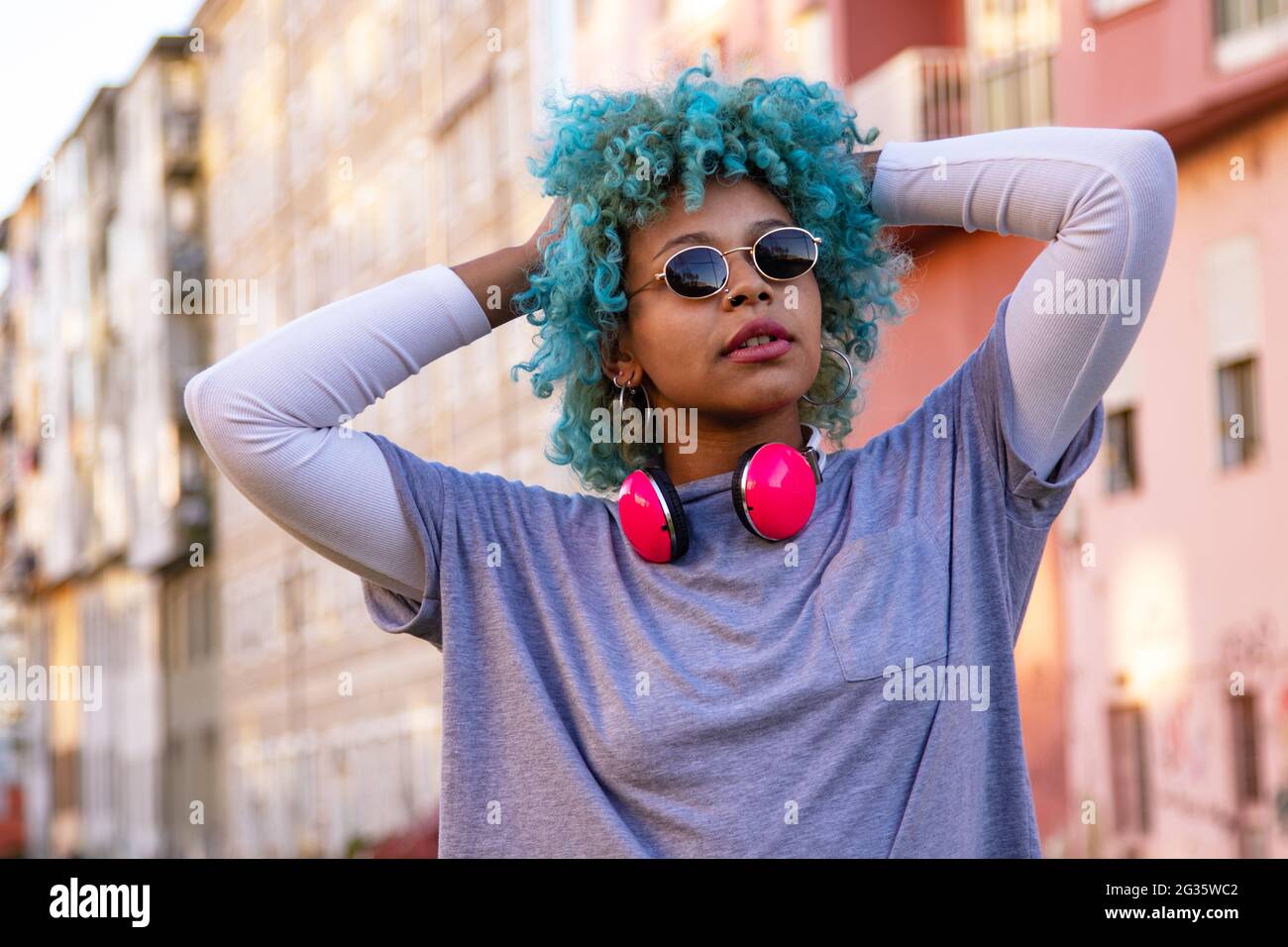 afro american girl with headphones on the street Stock Photo - Alamy