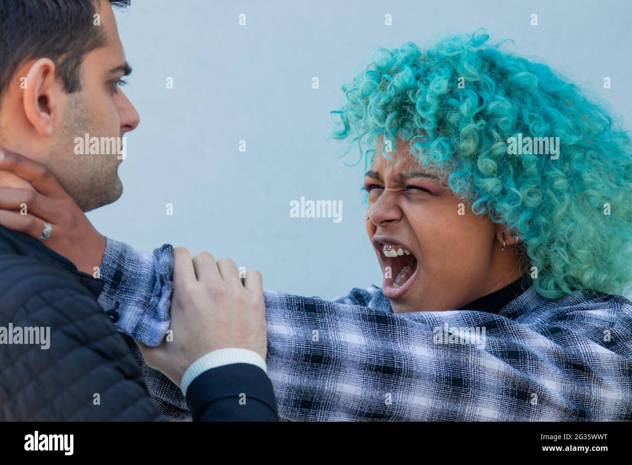 People fighting in the street date hi-res stock photography and images ...