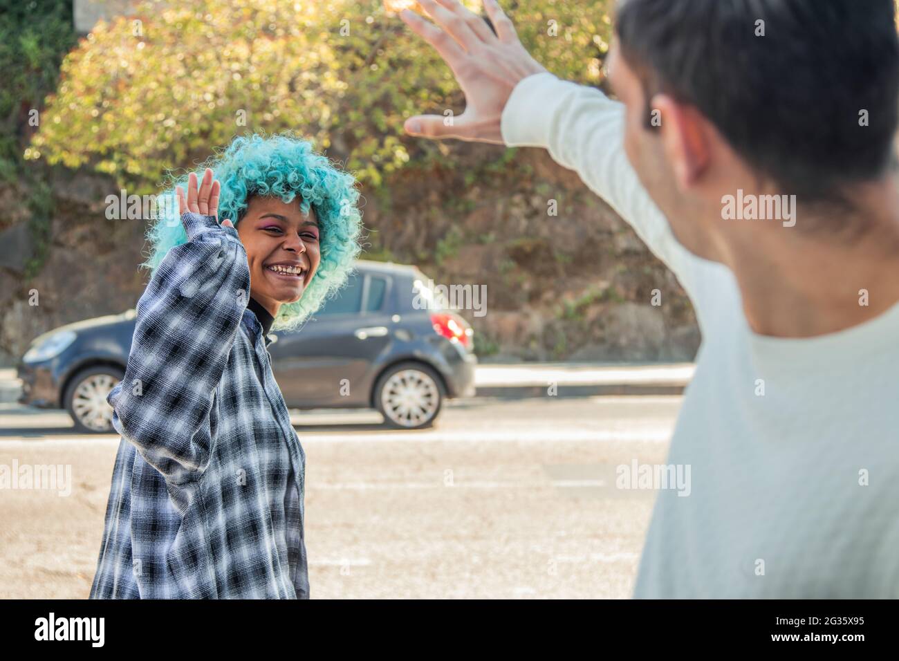 Boy waving goodbye hi-res stock photography and images - Alamy