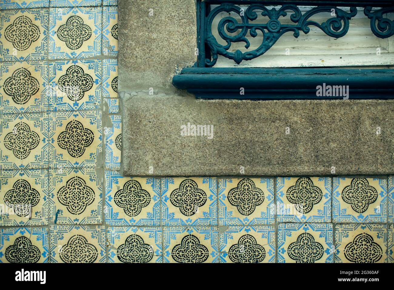 Traditional old tiles wall of building on street painted tin-glazed ...