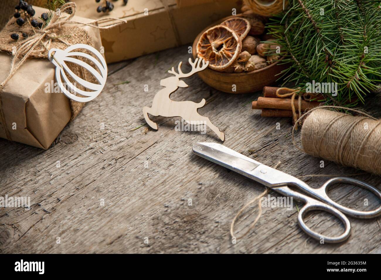 Gift wrapping for Christmas and New Year. Wooden background with place ...