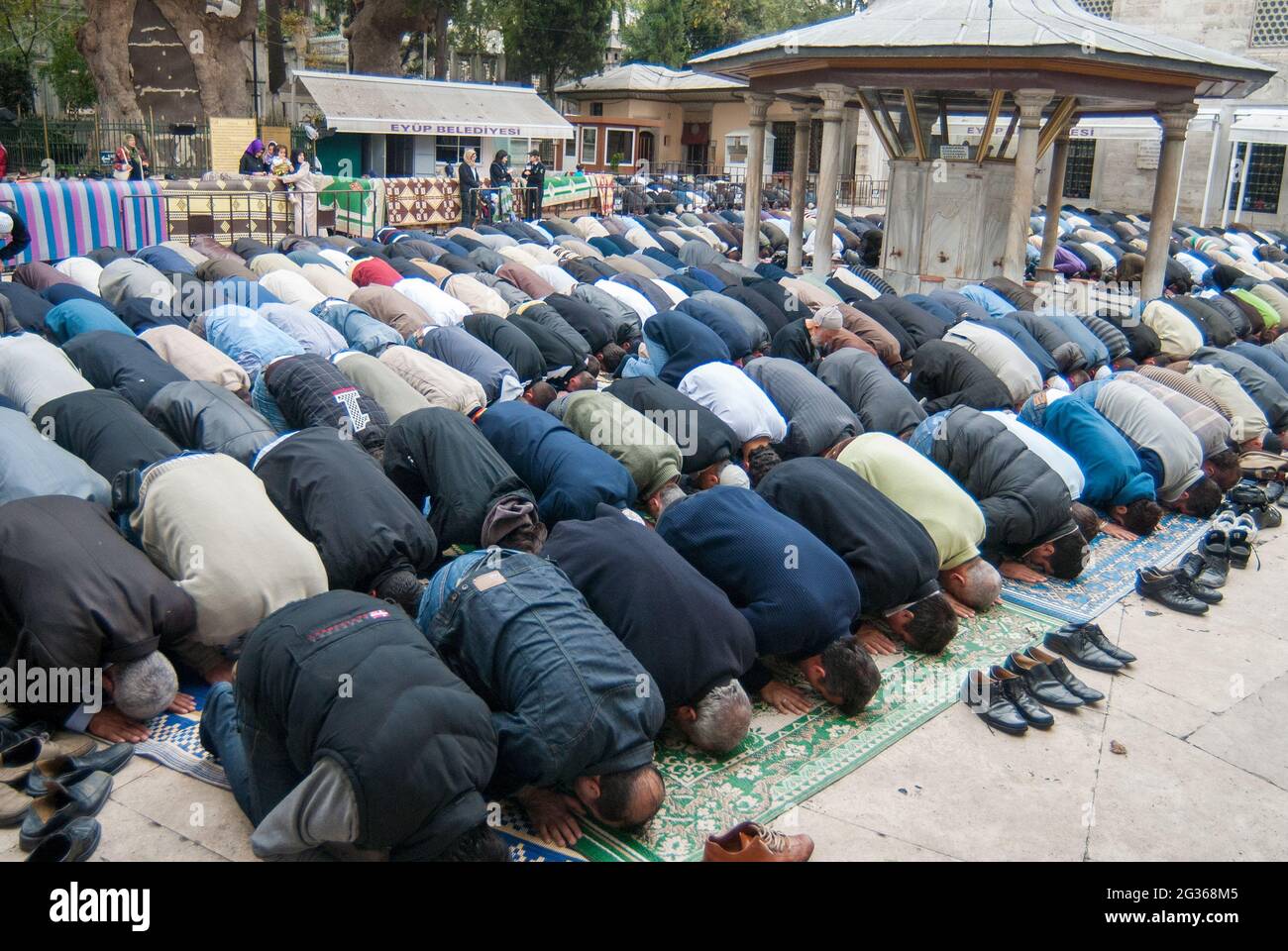 Muslims pray in street hi-res stock photography and images - Alamy