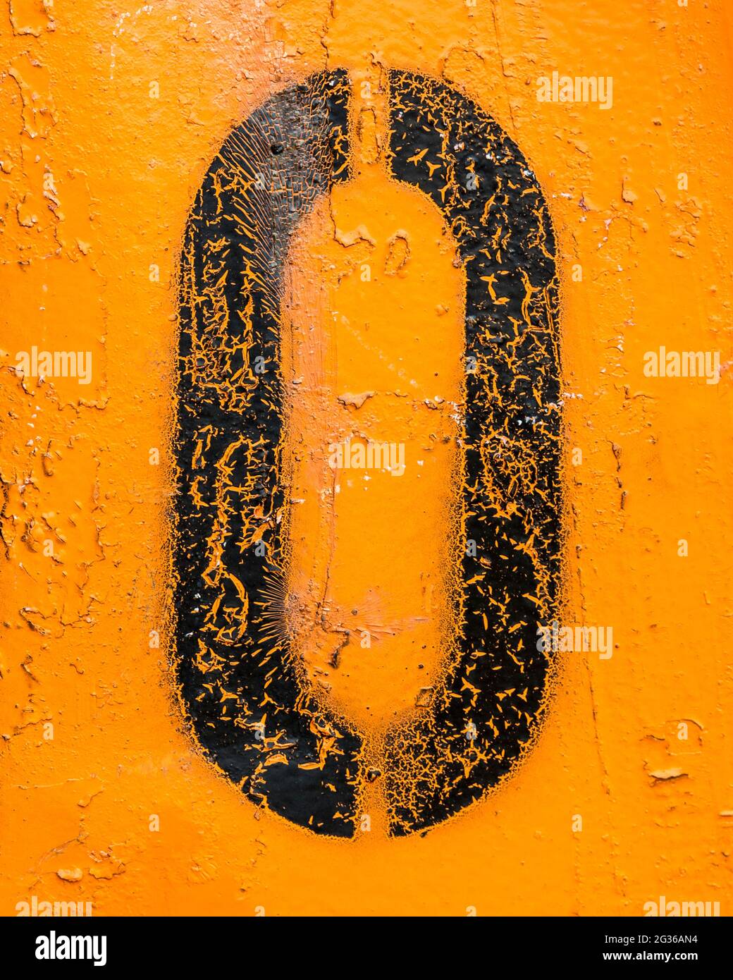 Black zero sprayed on bright orange background Stock Photo - Alamy