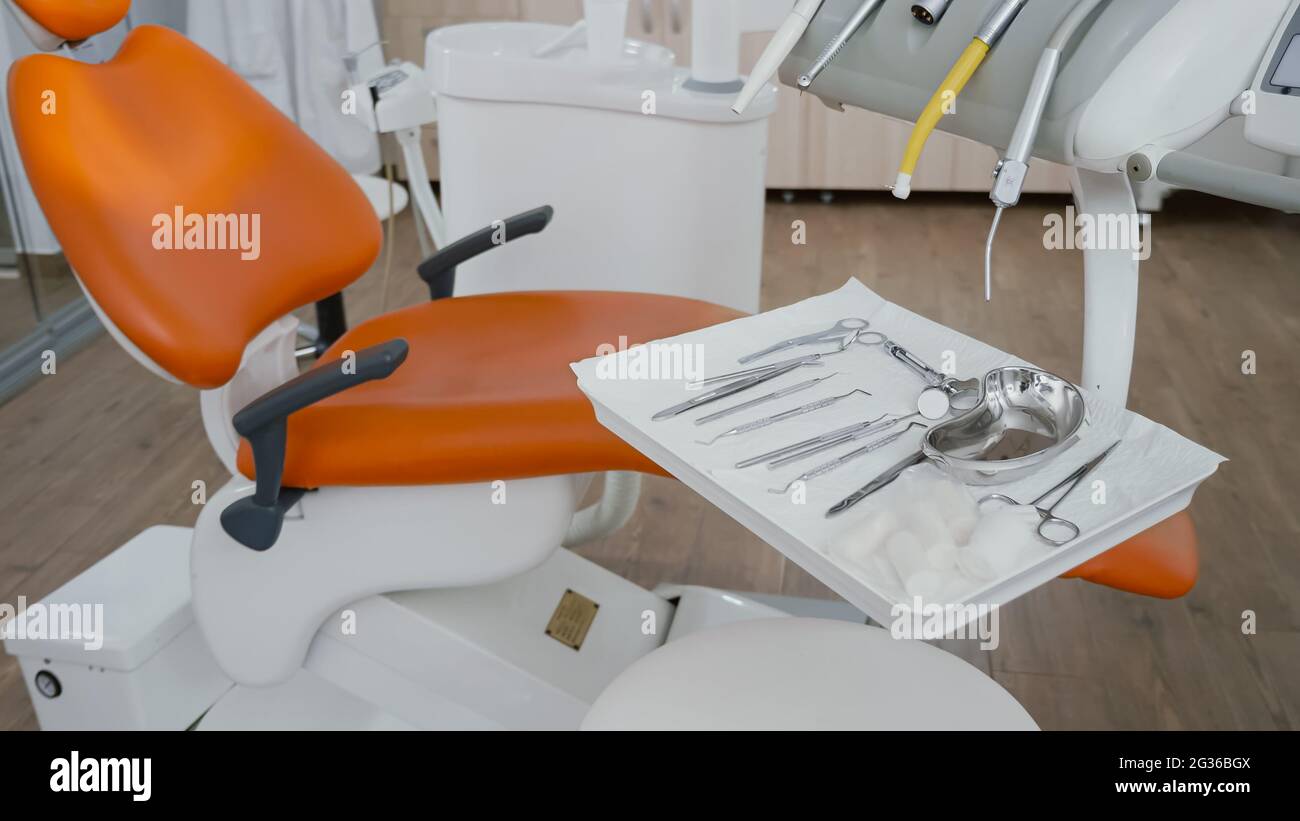 Close up revealing shot of medical dental tools ready for stomatology ...