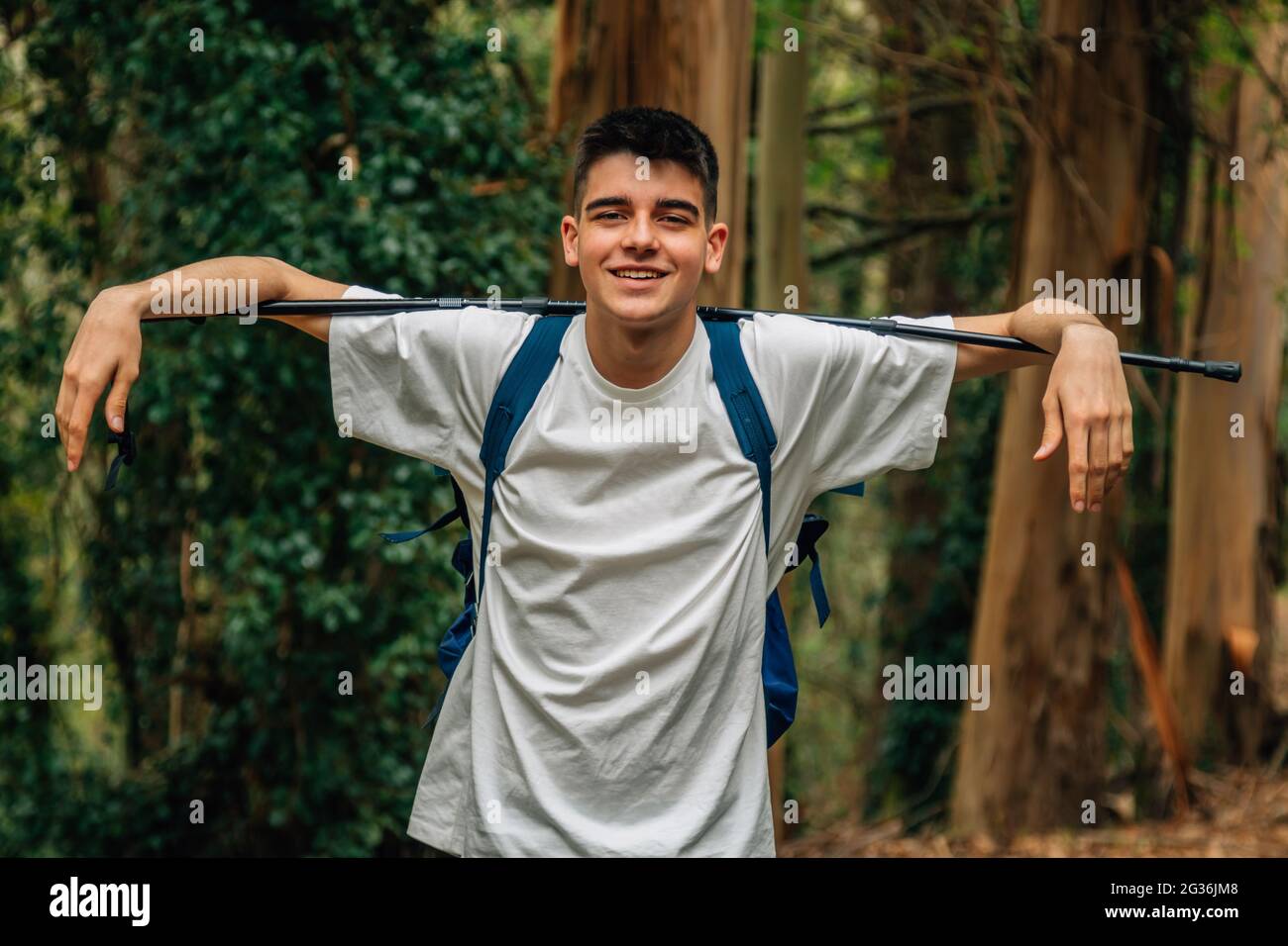 boy with backpack hiking or pilgrimage Stock Photo - Alamy