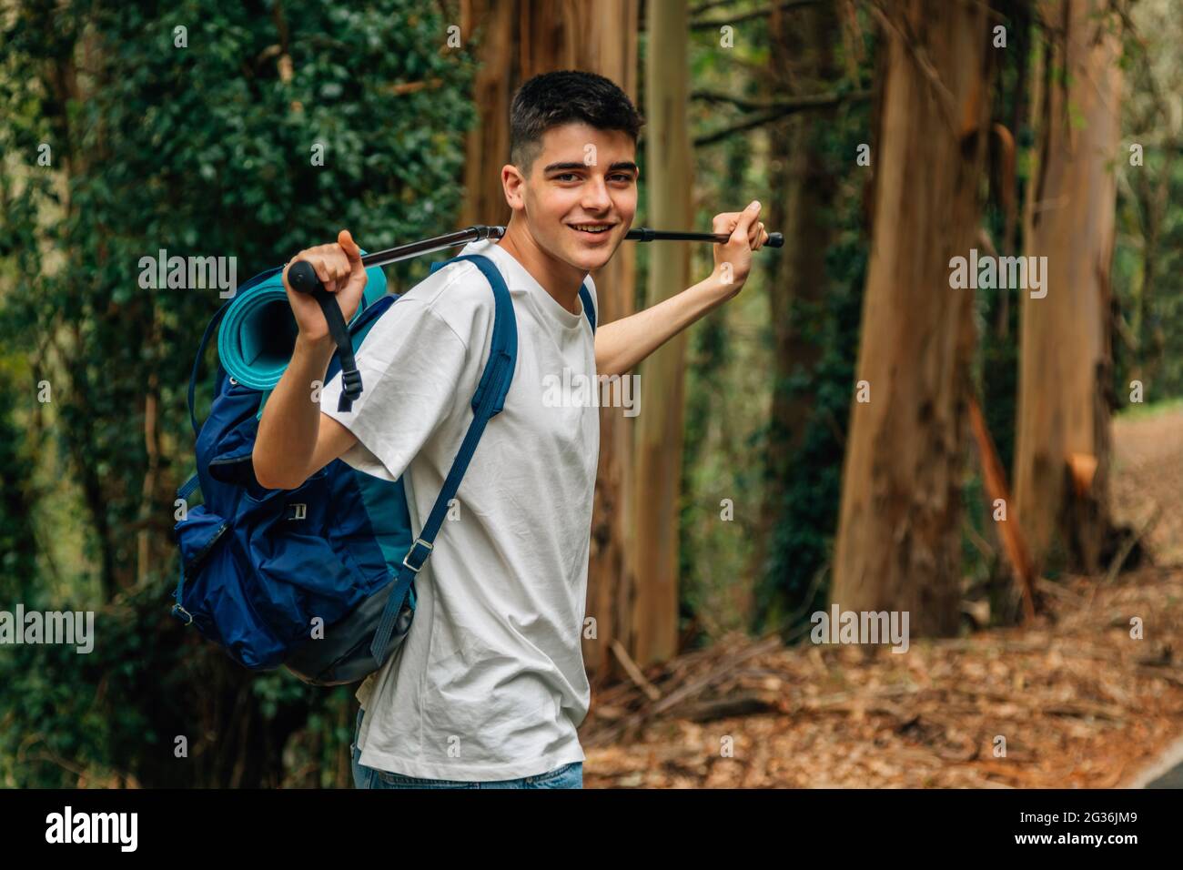 boy with backpack hiking or pilgrimage Stock Photo - Alamy