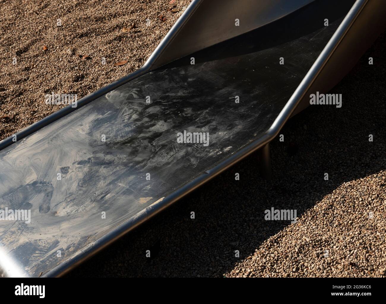 Metal slide in the playground Stock Photo - Alamy
