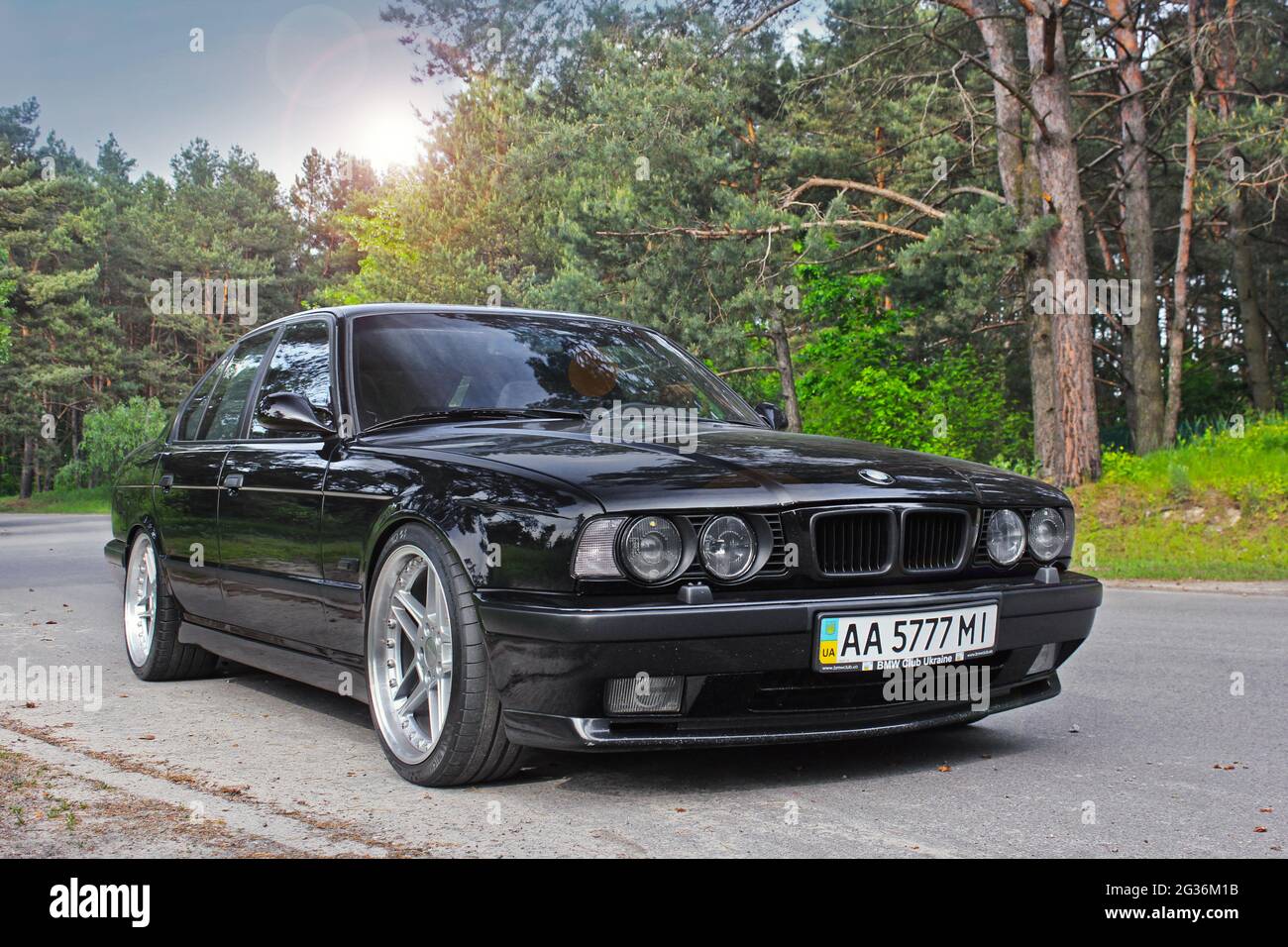 Kiev, Ukraine - May 17, 2014: BMW M5 (E34) against the background of the forest Stock Photo - Alamy