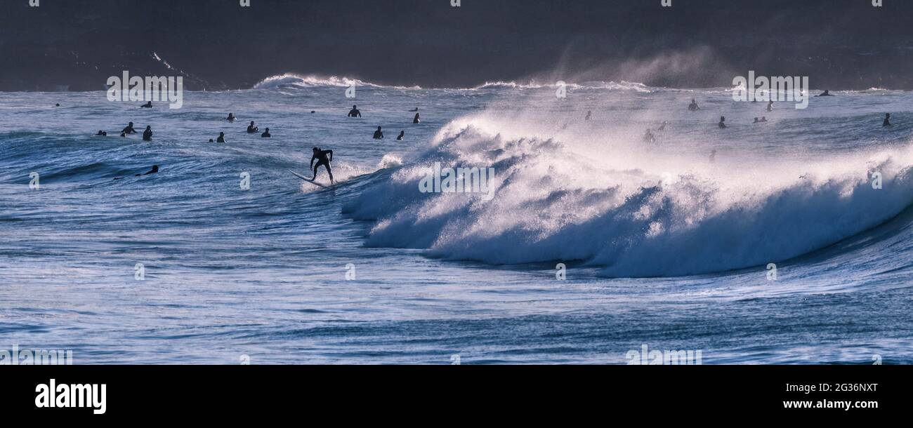 A panoramic image of wild surfing conditions as spray blown off large ...