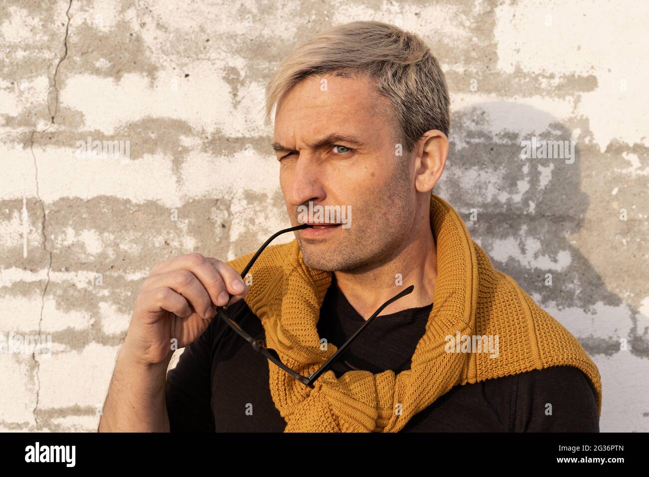 Portrait charming middle-aged blond man of model appearance with ...