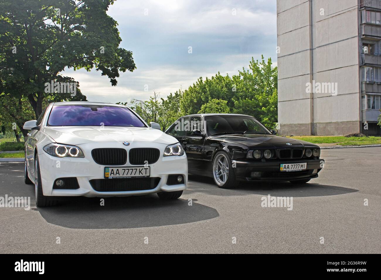 Kiev, Ukraine - May 17, 2014: Combo BMW. BMW M5 black and BMW (F10) in the city Stock Photo - Alamy