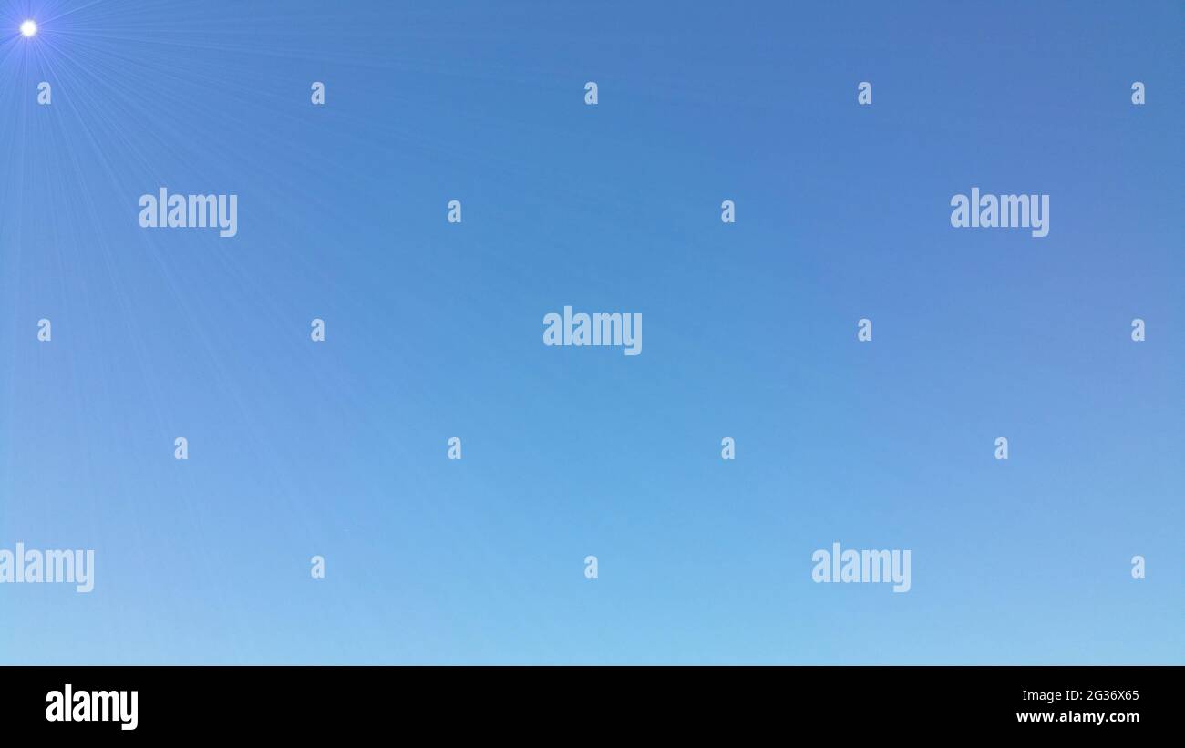 Sunrays without clouds hi-res stock photography and images - Alamy