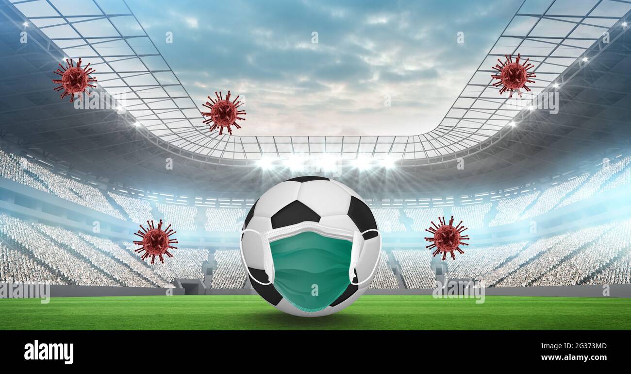 Composition of football with face mask and covid 19 cells over sports ...