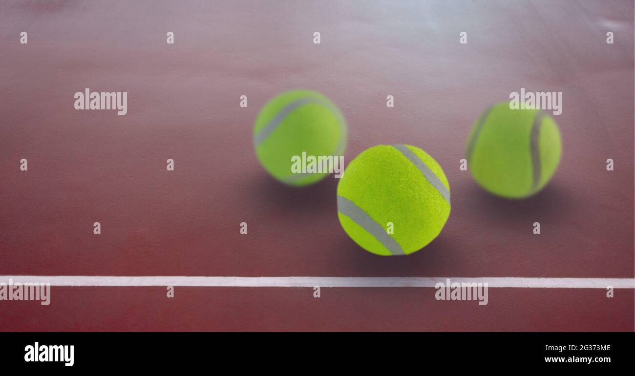 Composition of three tennis balls with copy space on tennis court Stock ...