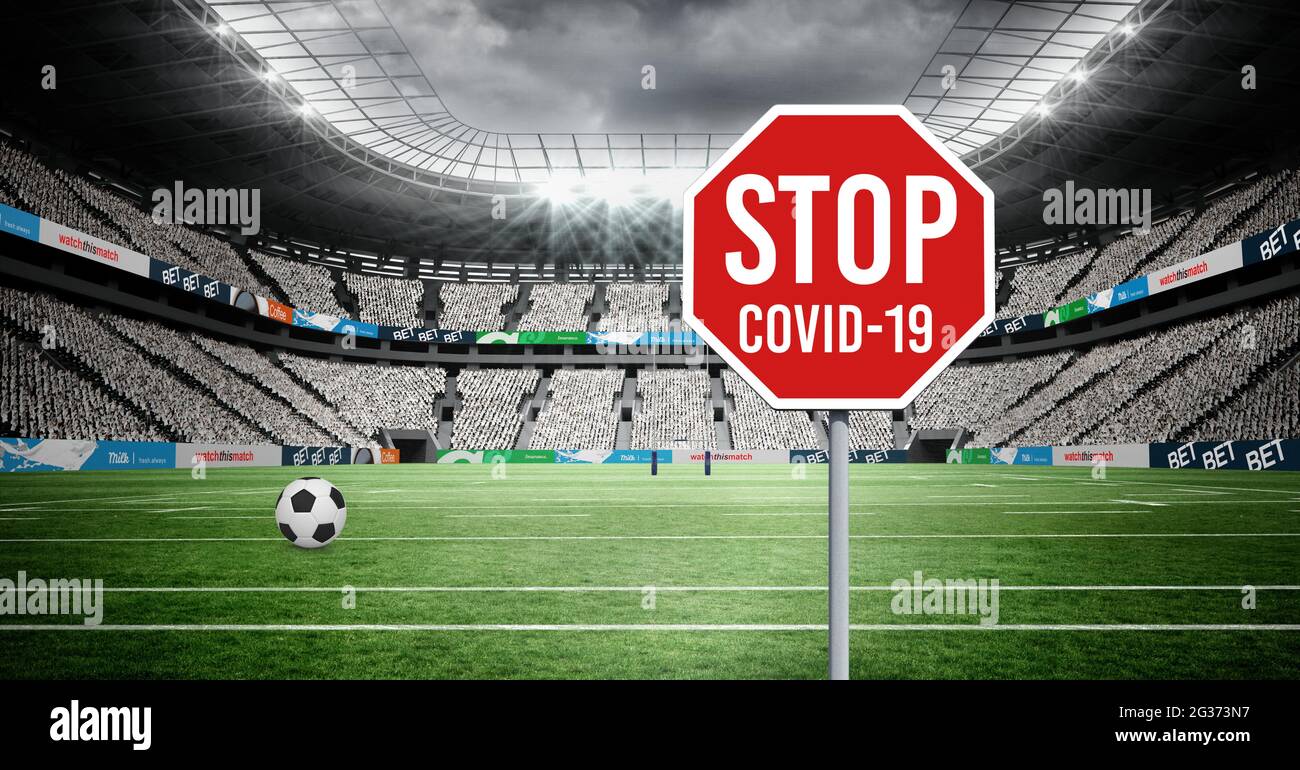 Composition of football and virus and warning road sign over sports ...