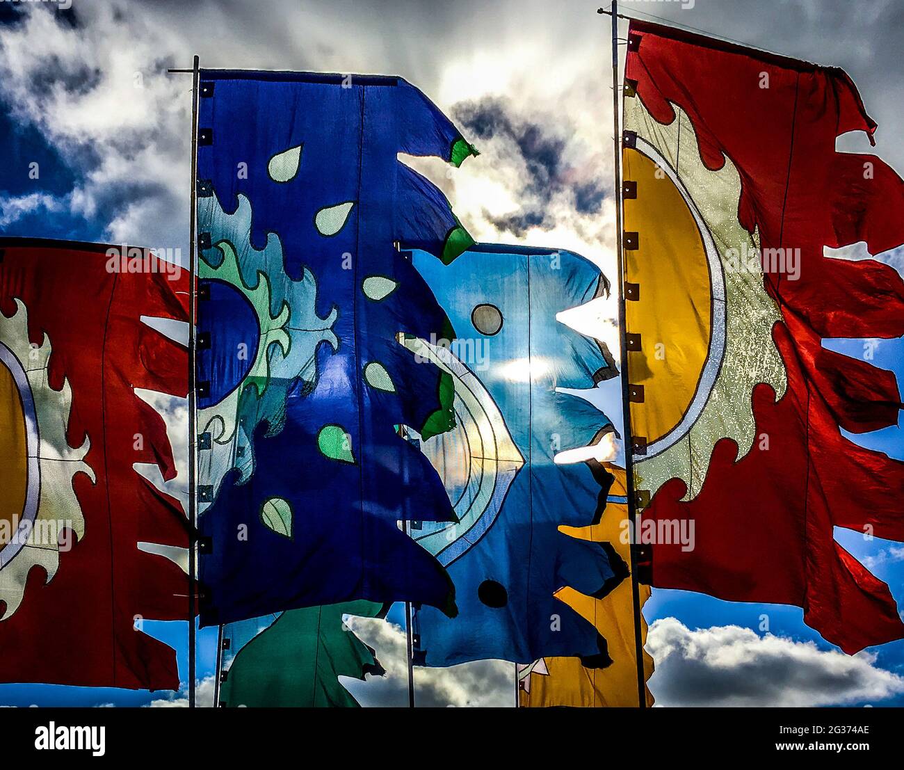 Colourful flags flying out in the wind Stock Photo - Alamy