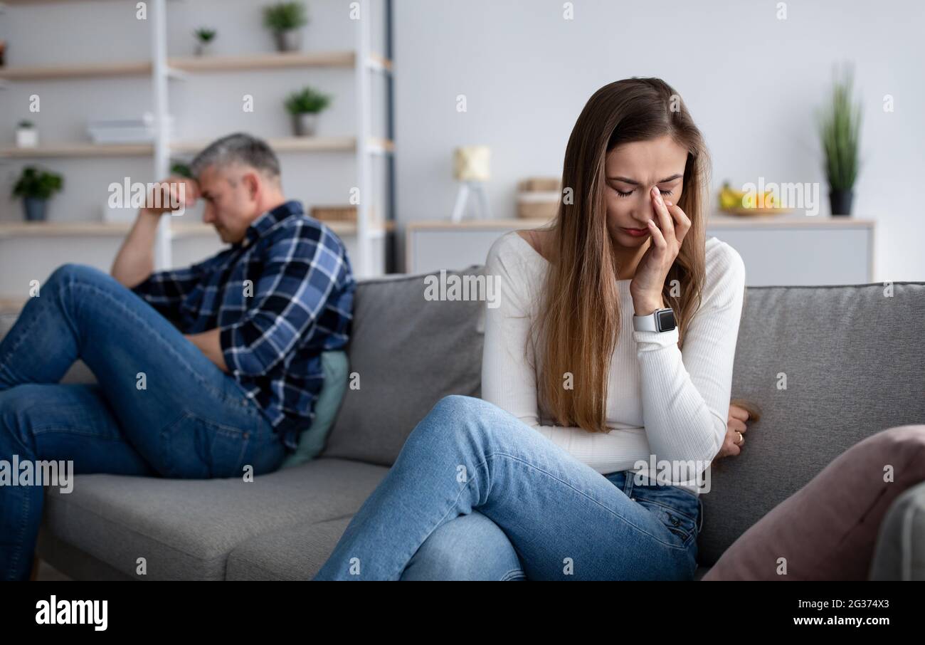 Couple woman crying on couch hi-res stock photography and images - Alamy