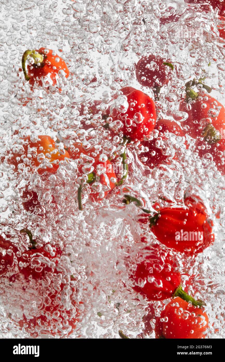 Wet red chillies hi-res stock photography and images - Alamy