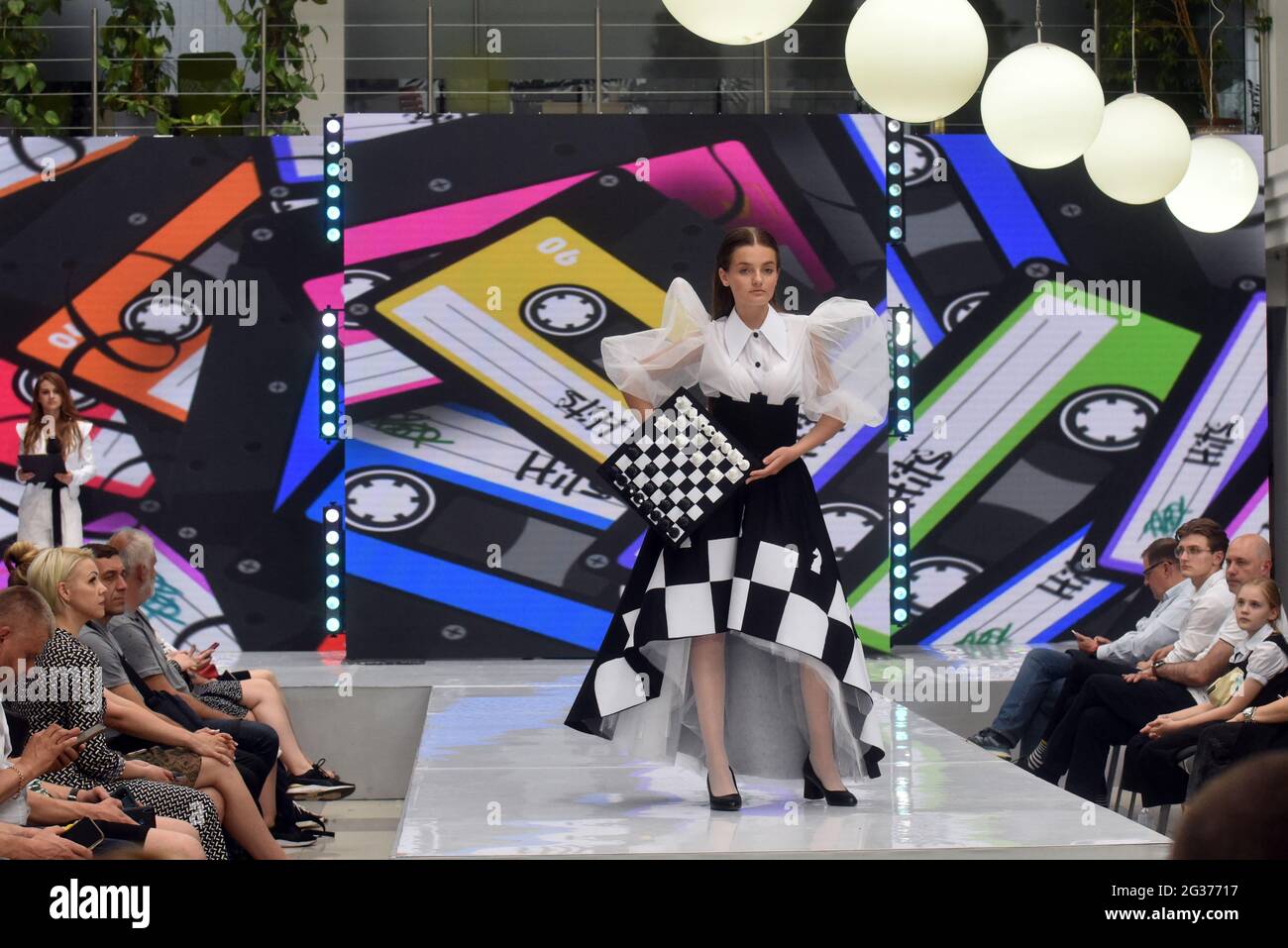 KYIV, UKRAINE - JUNE 13, 2021 - A girl presents an outfit during the ...