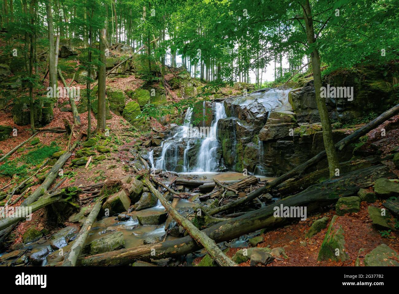 nature scenery with waterfall in spring. powerful water flow in the ...